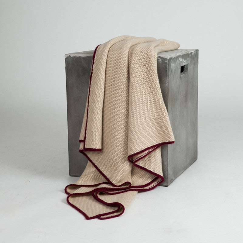 The delicate and extravagantly soft pique cashmere throw combines beige ...